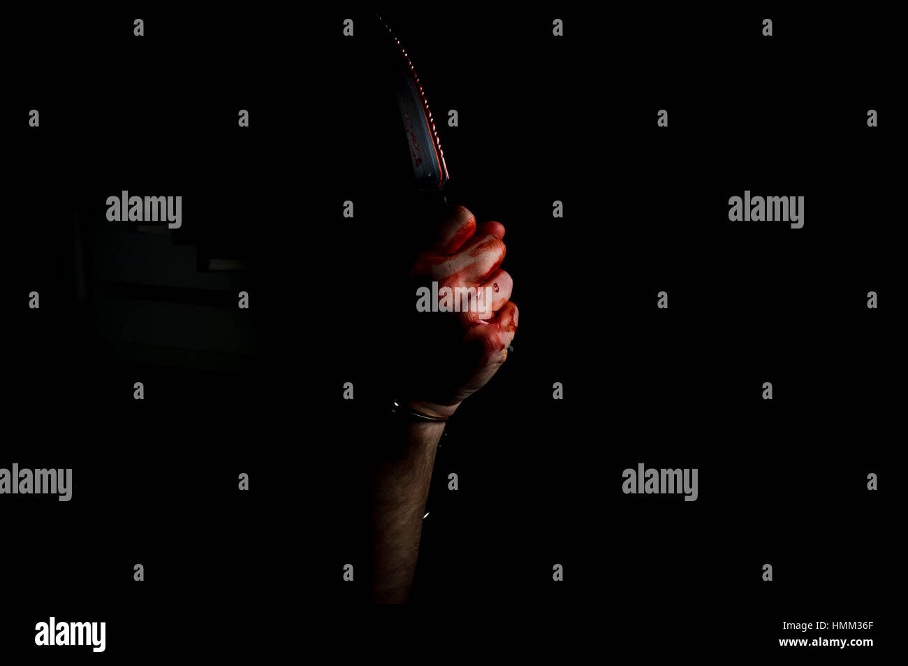 Murderer bloody hand holding knife hi-res stock photography and images ...