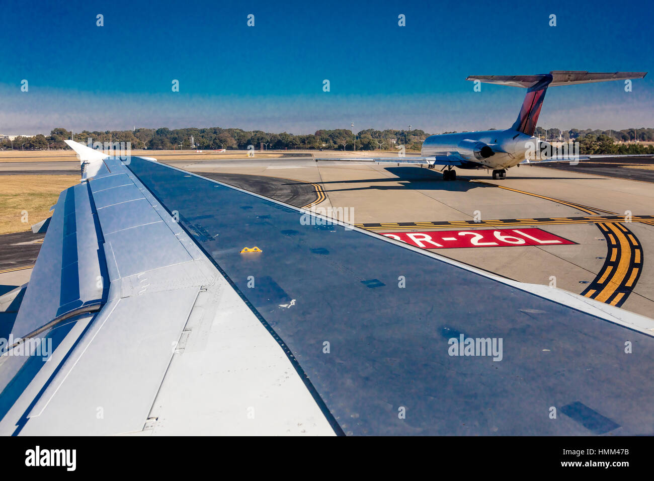 October 29, 2016 - Airplane wing view of plane taking off from airport ...