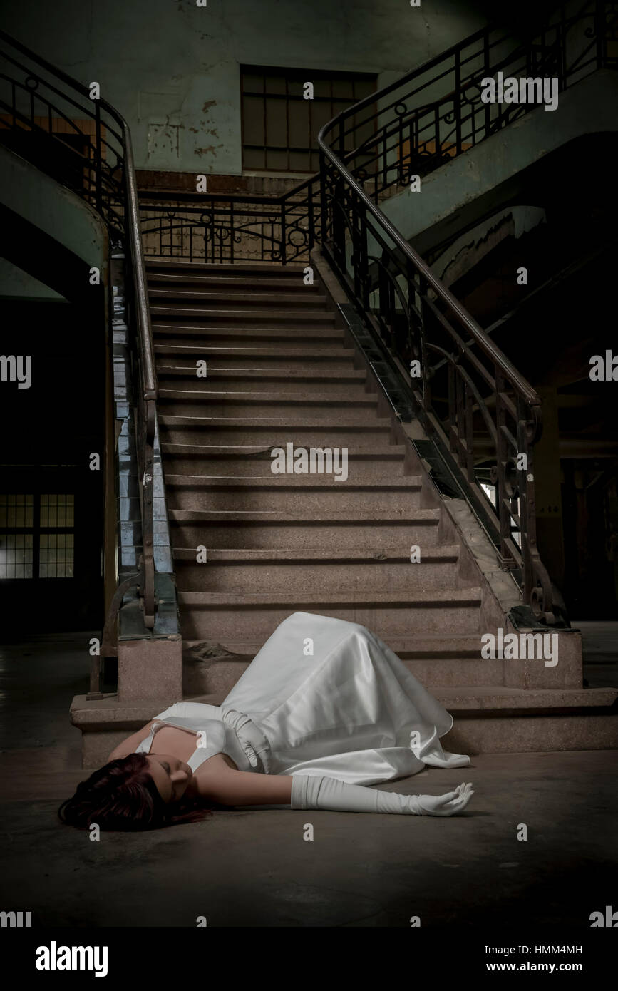 bride's fallen down the stairs by accident and lies unconscious on the ...