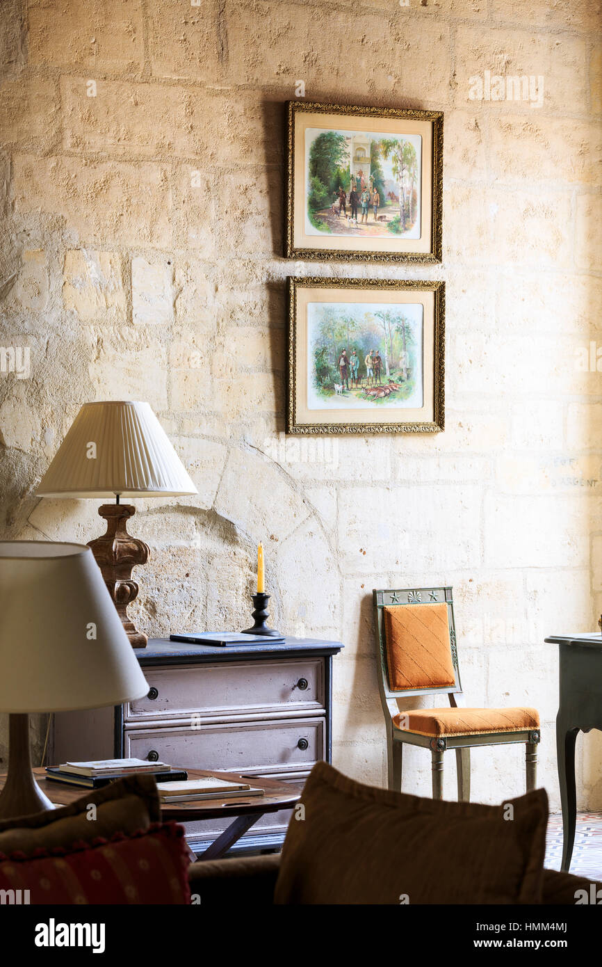 interior of period french house with stone wall and chair Stock Photo ...