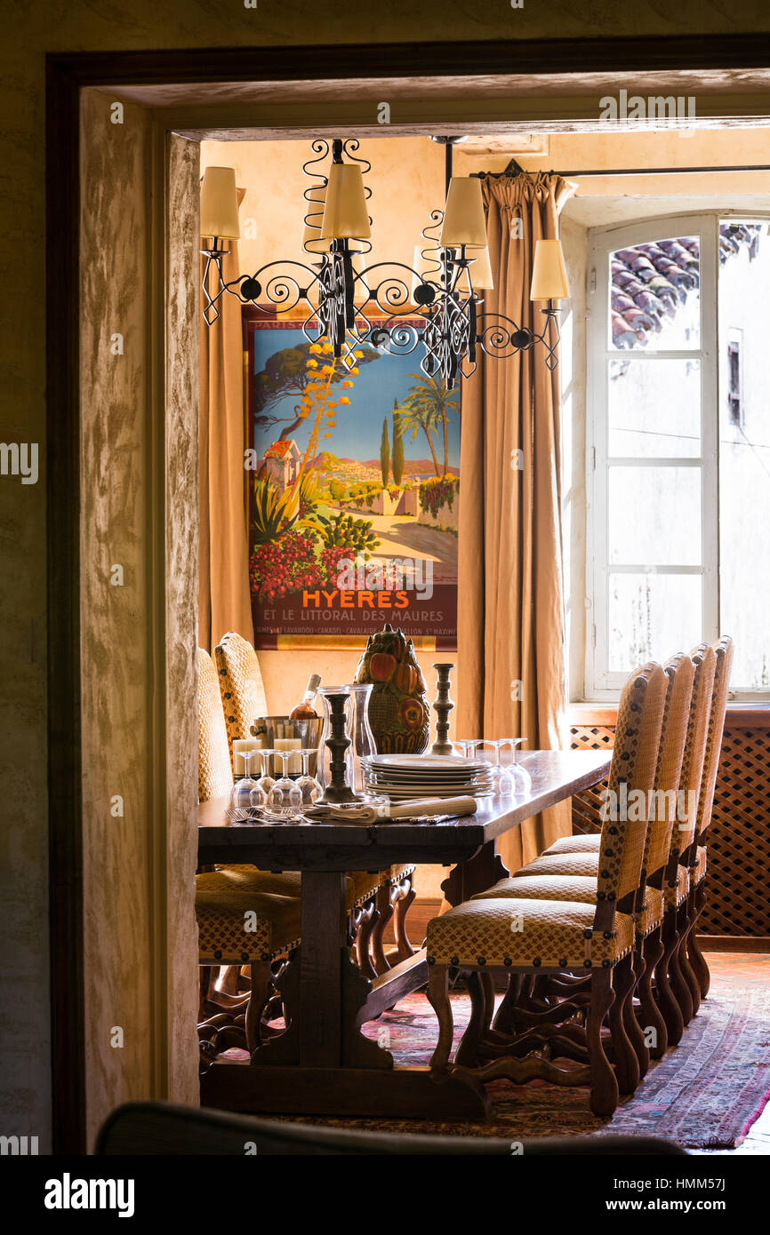 period french dining room with table and chairs, chandelier and ...
