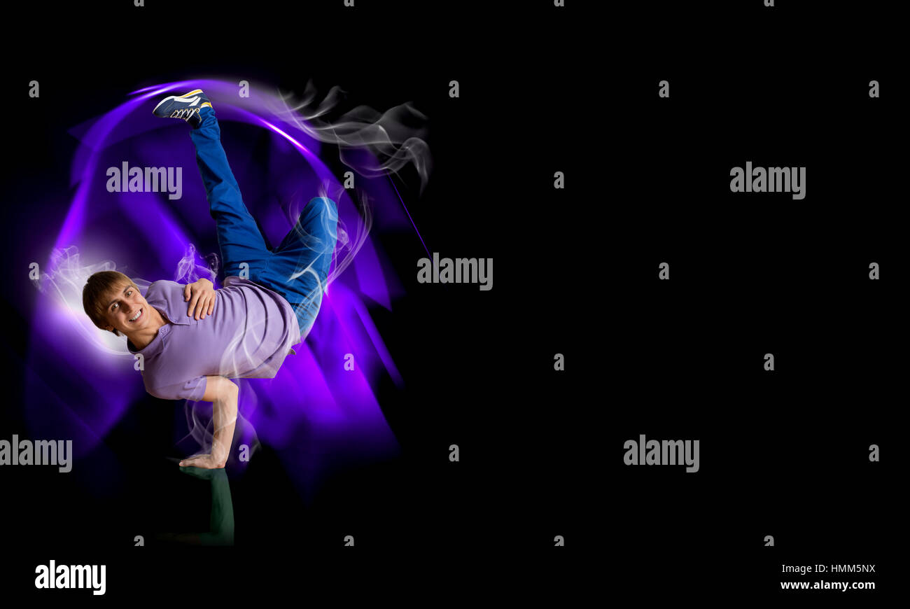 Breakdancer standing on hand Stock Photo - Alamy