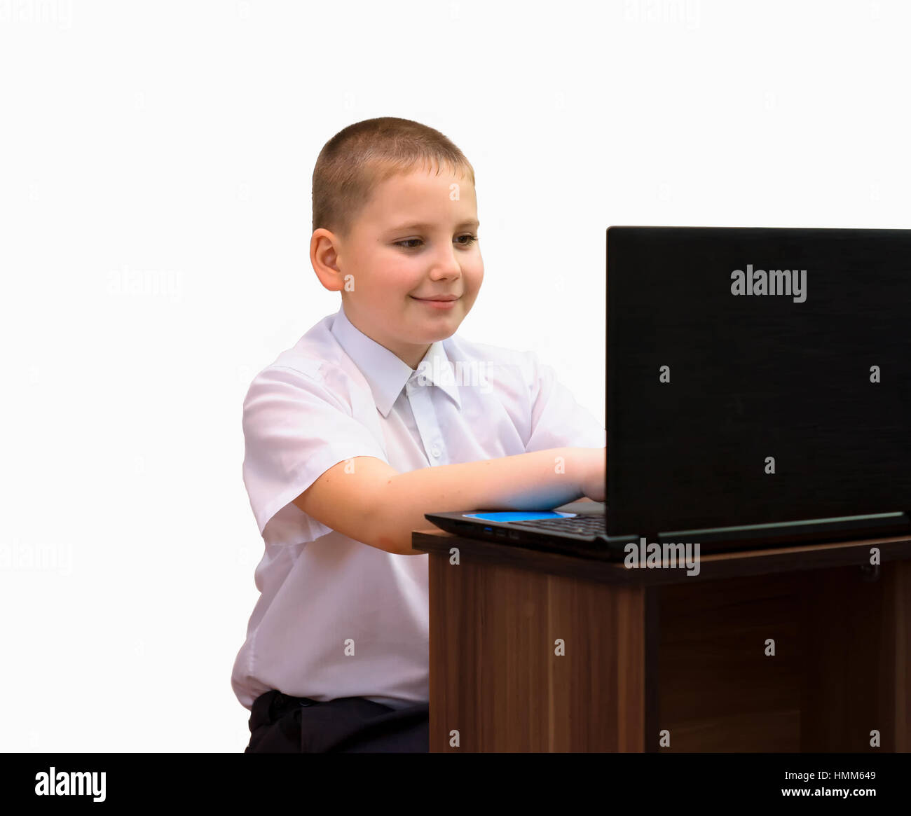 Boy with white laptop hi-res stock photography and images - Alamy