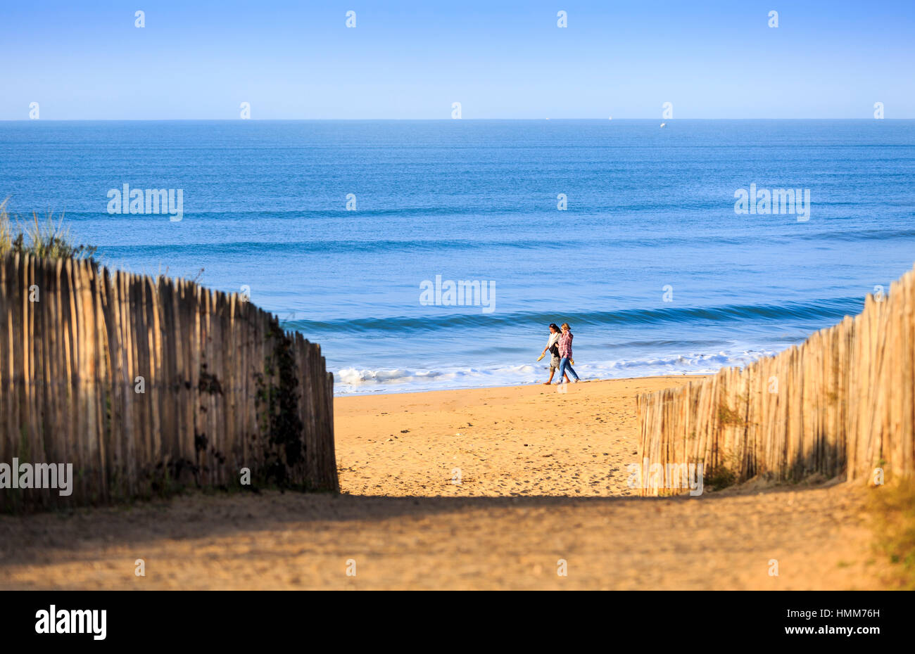 couple walking on Vendee Beach near La Tranche Sur Mer, France Stock ...