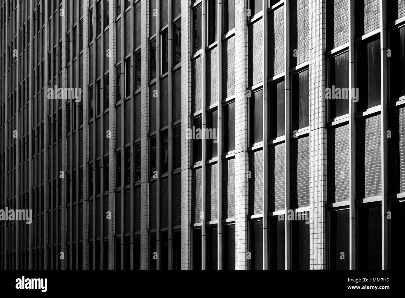 Windows of commercial building in Hong Kong with B&W color Stock Photo ...
