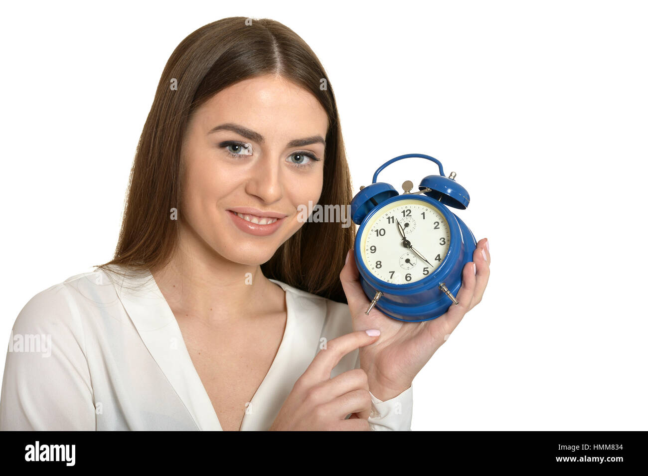 Beautiful woman with clock Stock Photo - Alamy