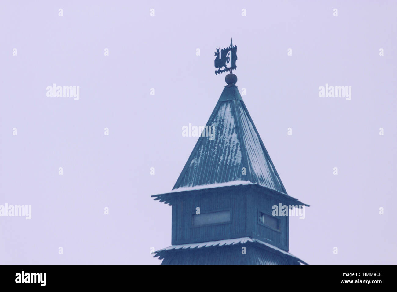Brick round corner tower with a spire Stock Photo - Alamy