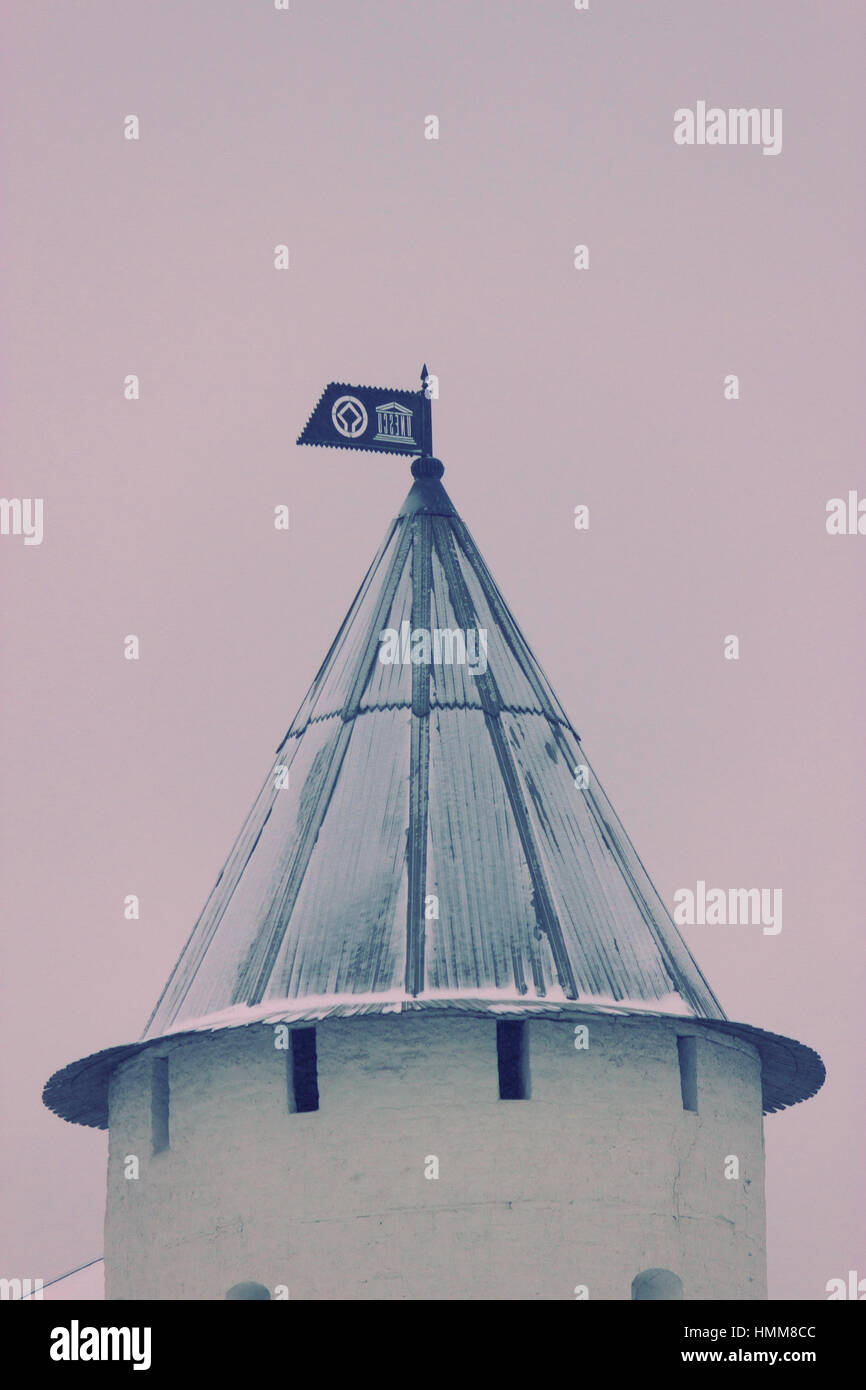 Brick round corner tower with a spire Stock Photo - Alamy