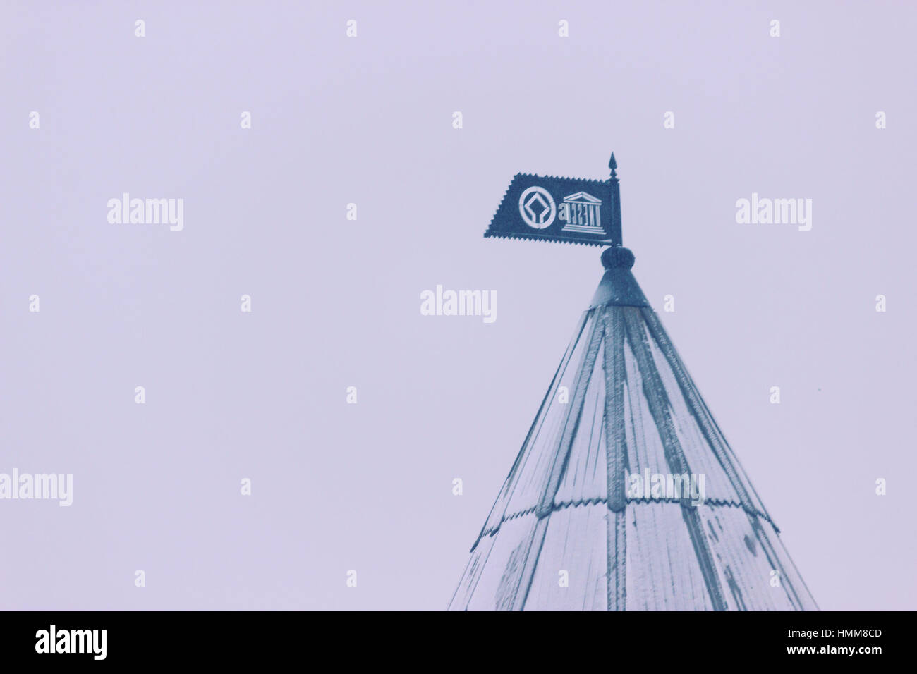 Brick round corner tower with a spire Stock Photo - Alamy