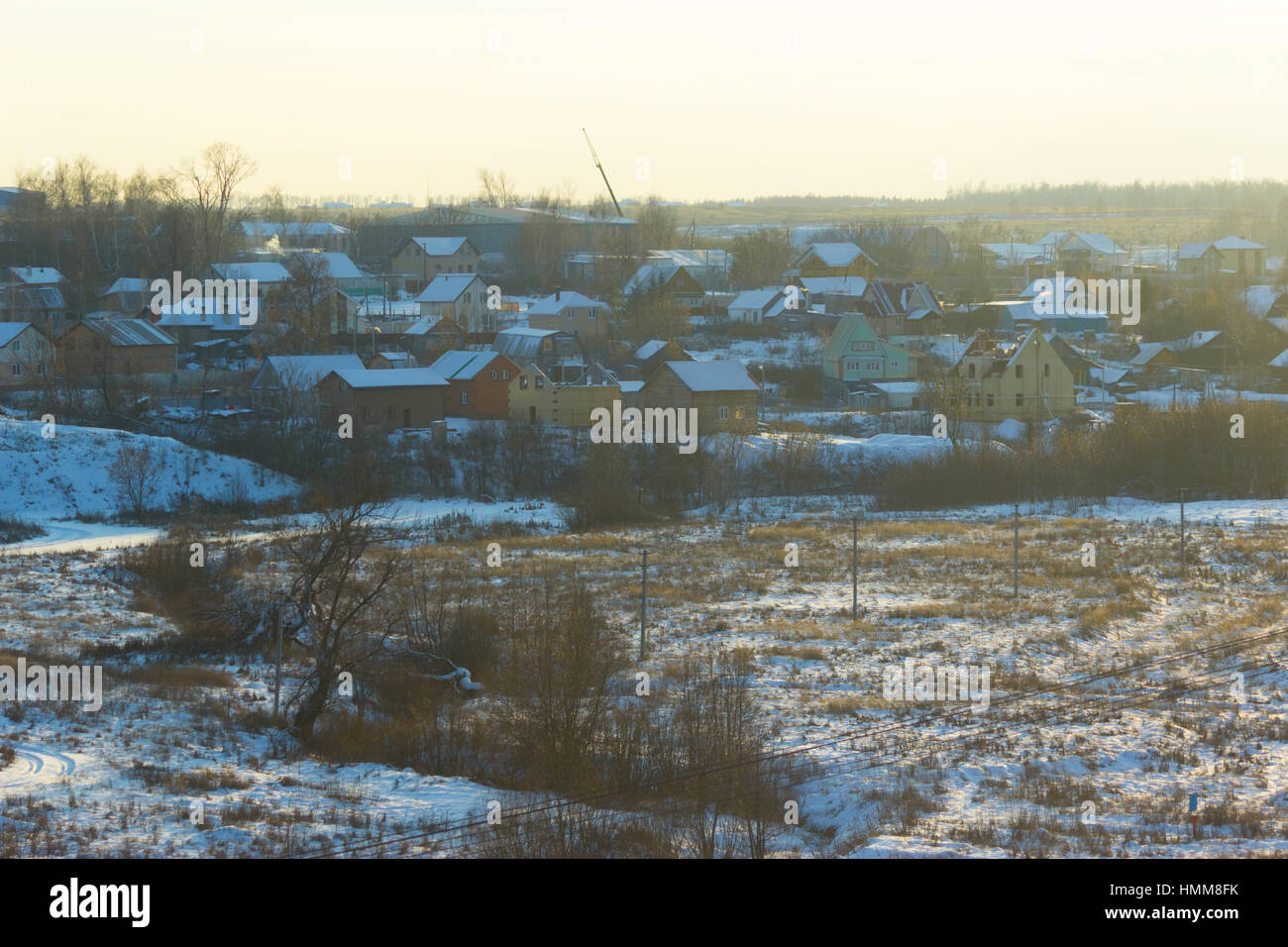 beautiful winter landscape. cottages in a sunlight Stock Photo - Alamy