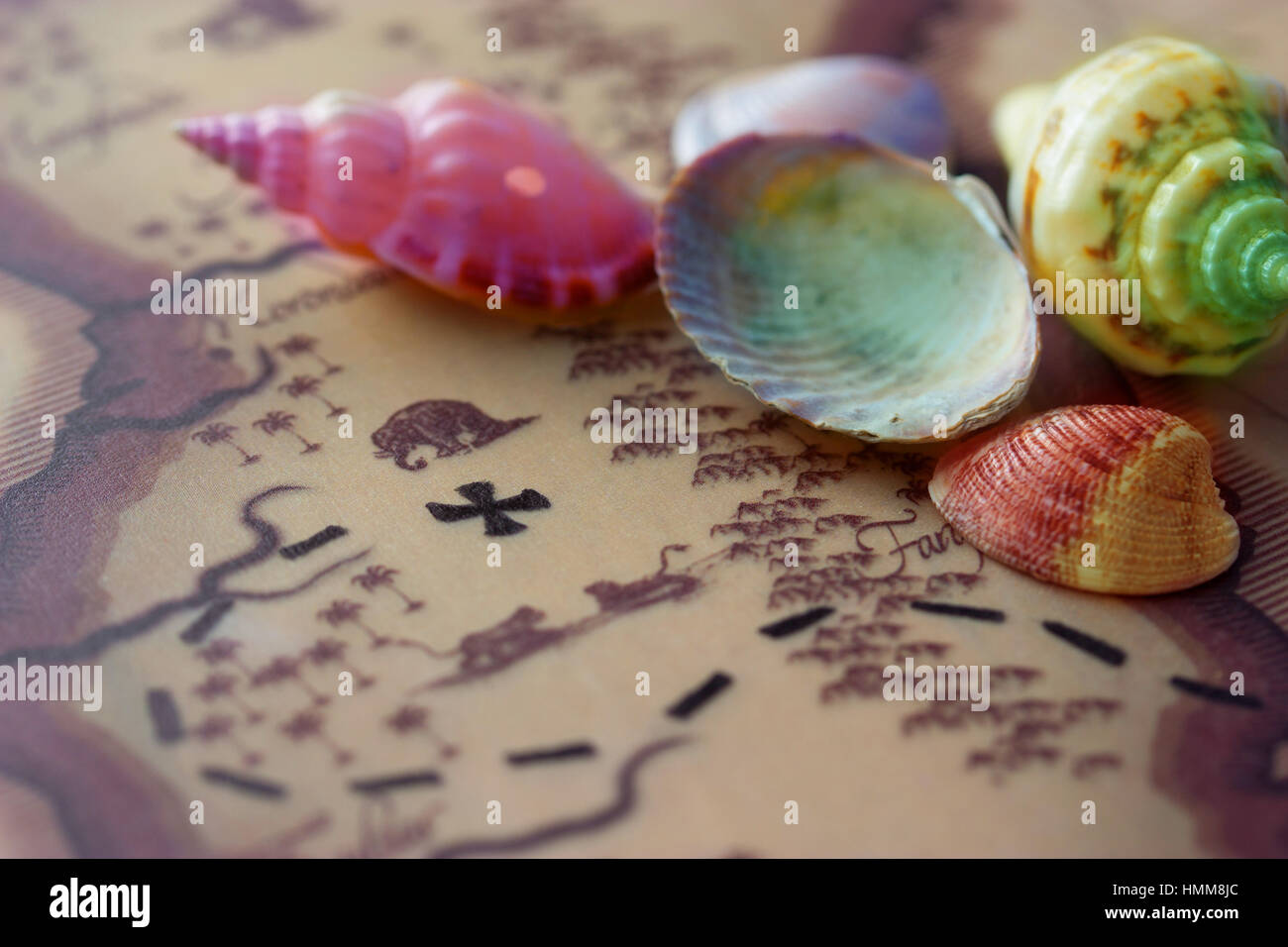 hidden treasure map and colorful shells. pirate lifestyle concept Stock ...