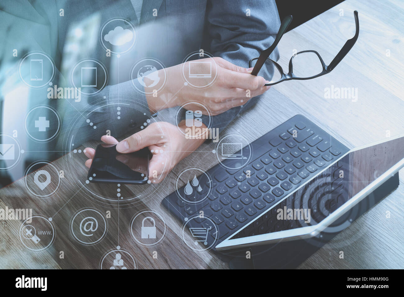 top view of businessman hand using smart phone,mobile payments online shopping,omni channel ...