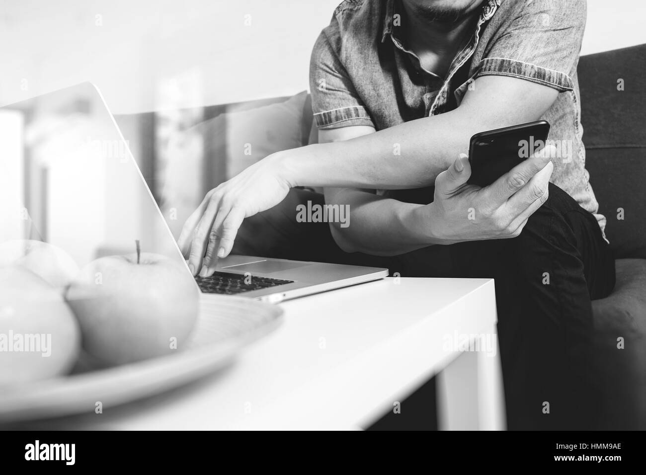 Man using laptop wooden Black and White Stock Photos & Images - Alamy