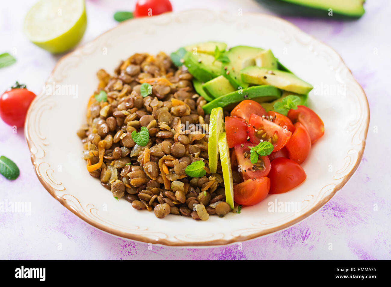 Diet menu. Healthy lifestyle. Lentils porridge and fresh vegetables ...