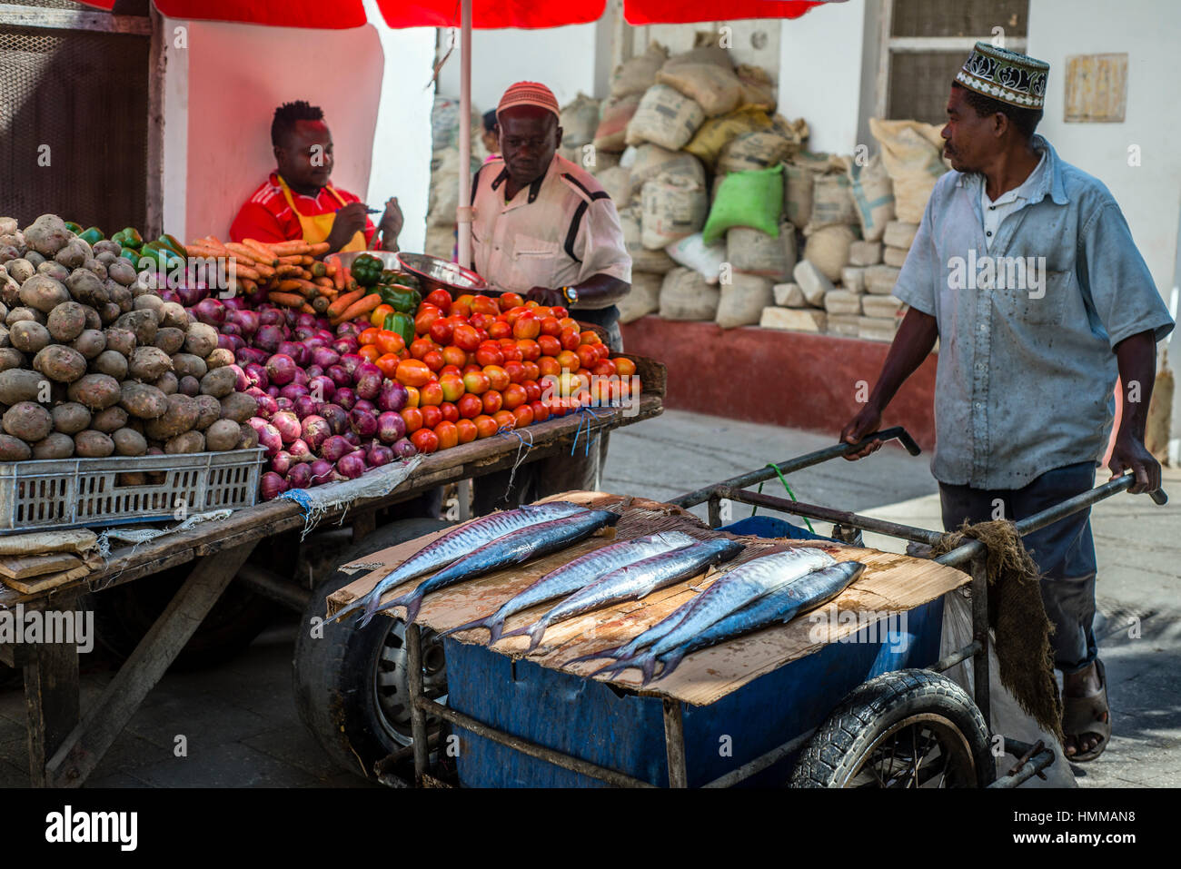 Local traders at the market of Stone Town, Zanzibar, Tanzania Stock ...