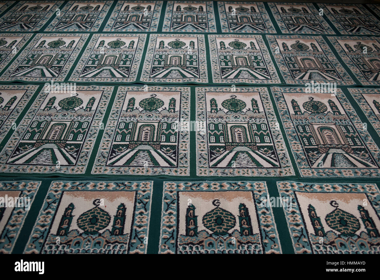 View of Muslim praying carpets inside the Grand Mosque in Medan ...