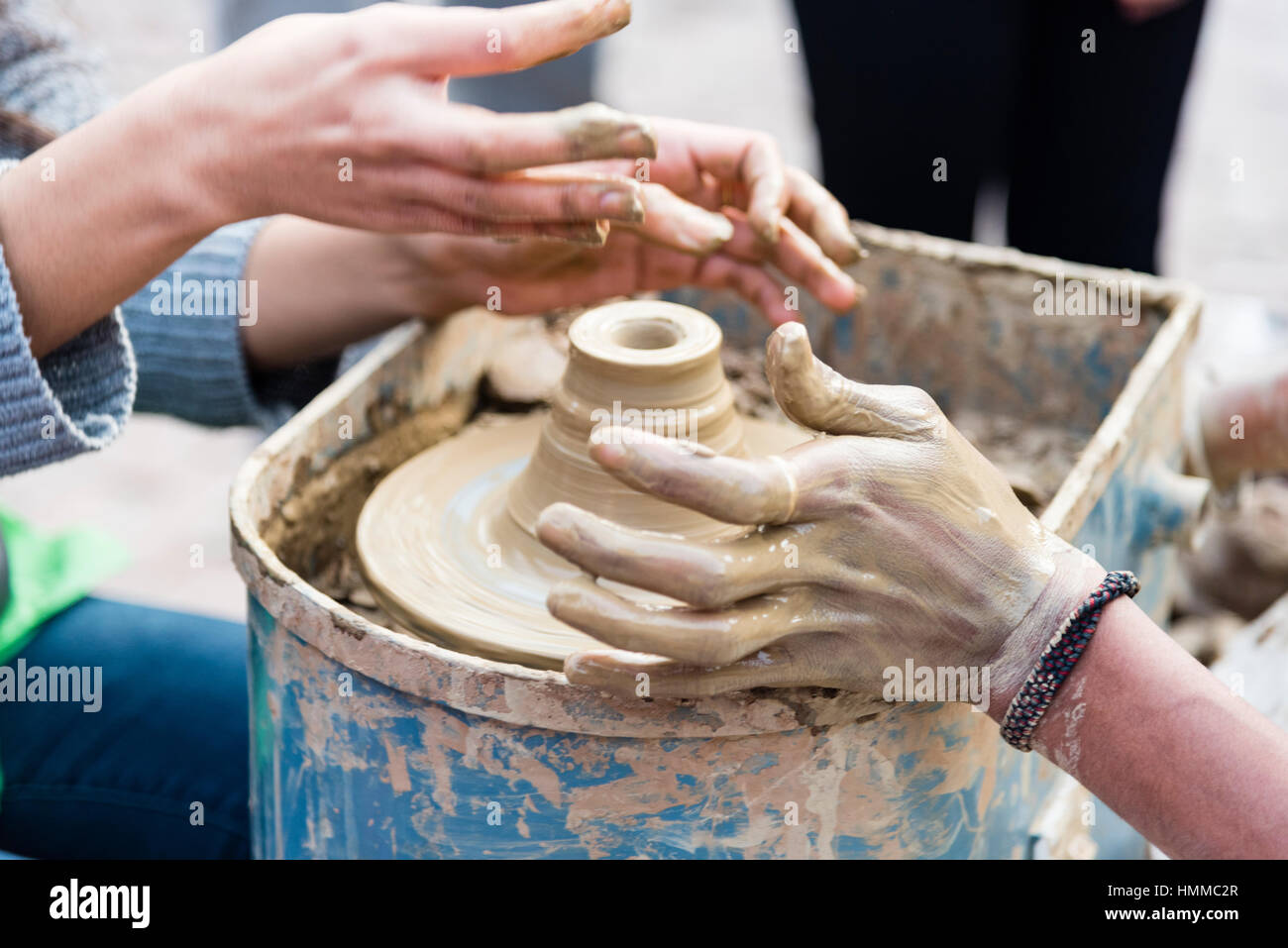 A potter giving pottery making lesson Stock Photo - Alamy