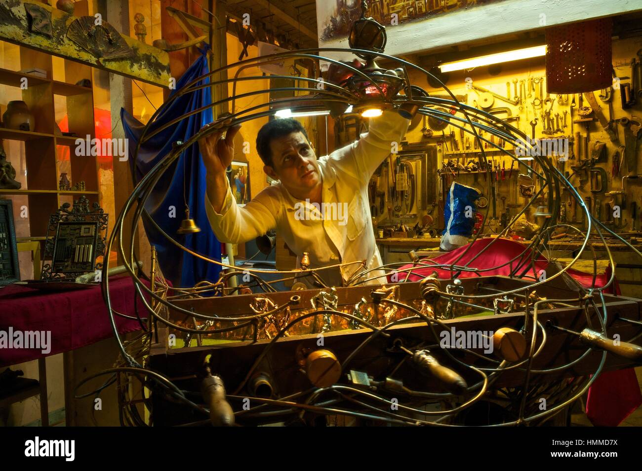 Cuban artist Leo D´Lazaro surrounded by his fantastical creations Stock ...