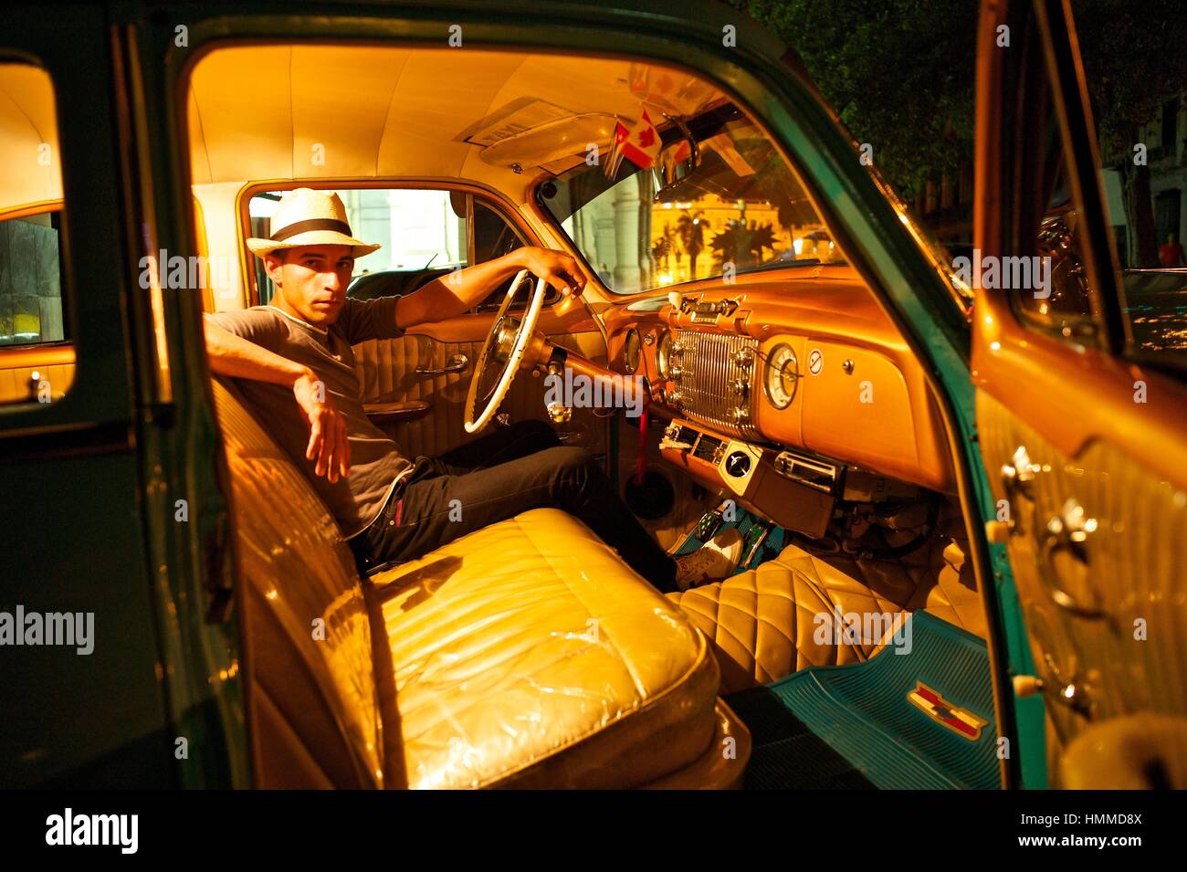 Now a cuentapropista, a freelance taxi driver waits for tourits in his ...