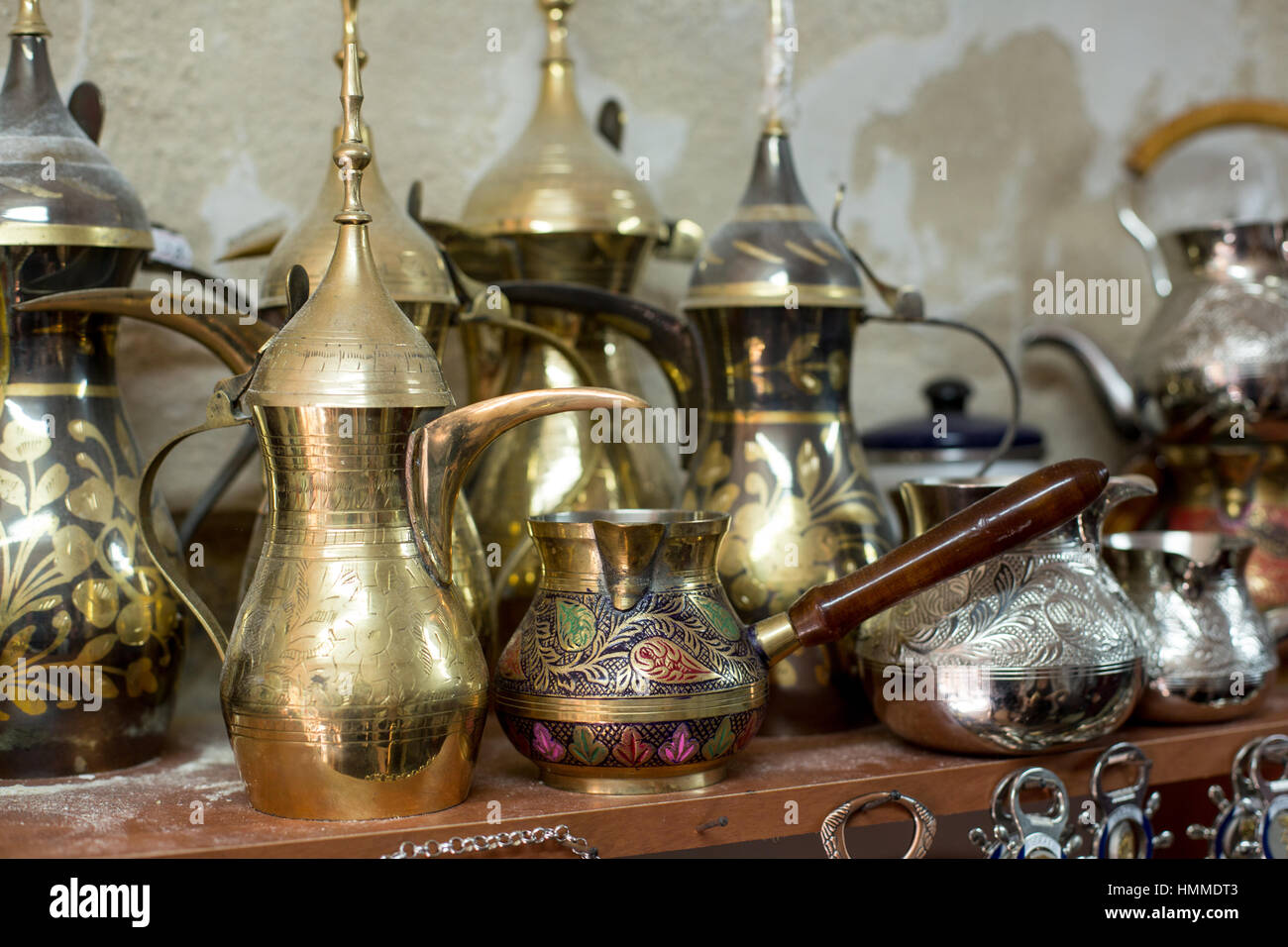 Traditional arabic coffee pots on a shelves of arabic market in Akko ...