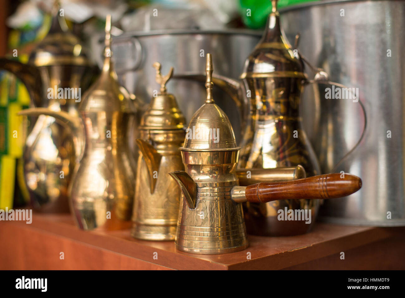 Traditional arabic coffee pots on a shelves of arabic market in Akko ...