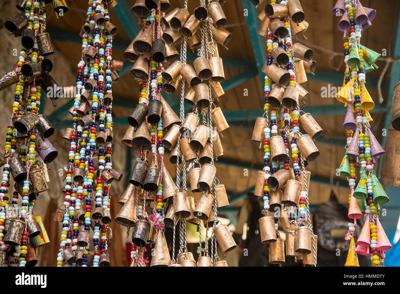 Aged decorative souvenir bells of different size selling on arabic ...