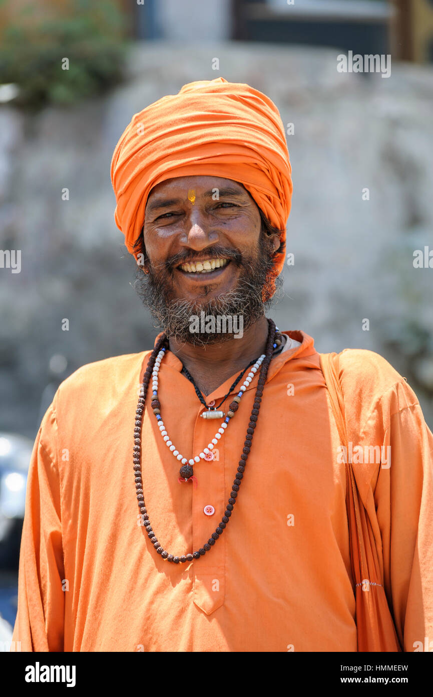 Portrait of an Indian Sadhu with a beard, adorned with a golden bindi ...