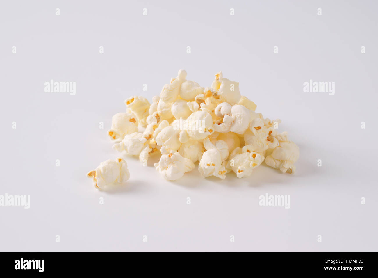 handful of fresh popcorn on white background Stock Photo - Alamy