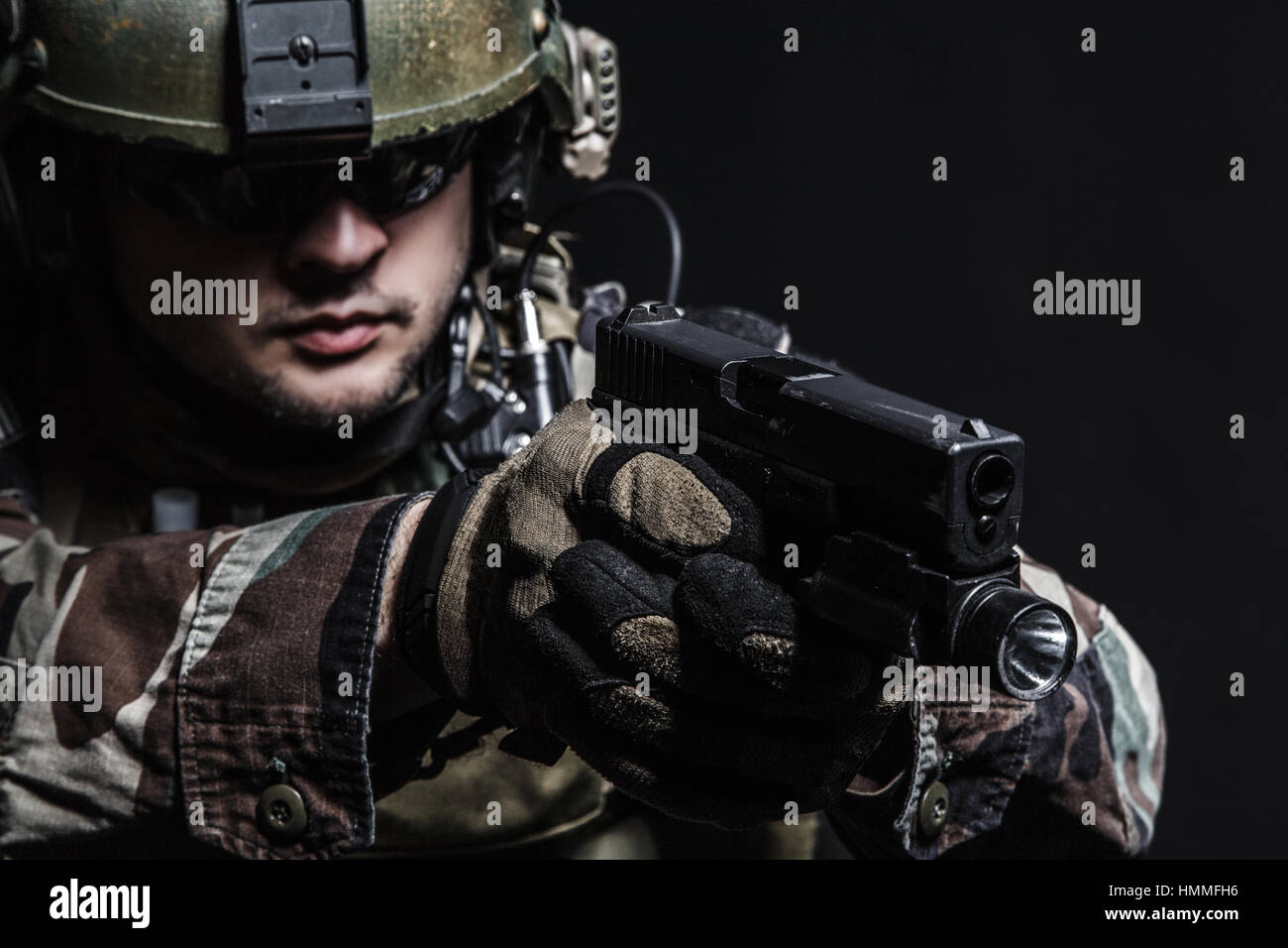 soldier with pistol Stock Photo - Alamy