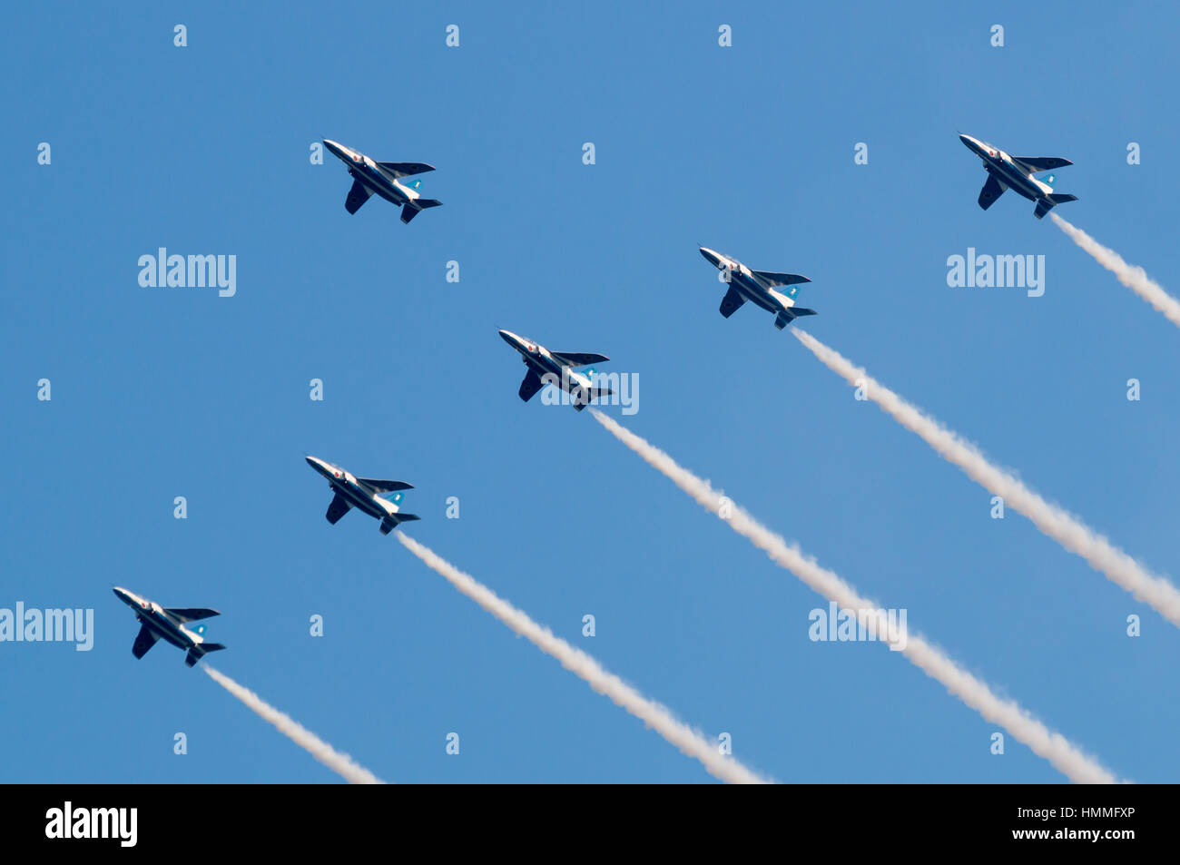 Formation flight of Blue Impulse over the Tokyo olympics stadium Stock ...