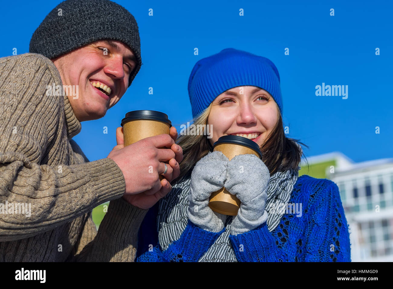 Couple in winter sweater hugging hi-res stock photography and images ...