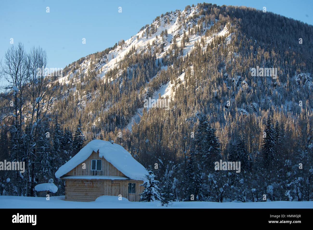 Traditional old wooden house in winter Stock Photo - Alamy
