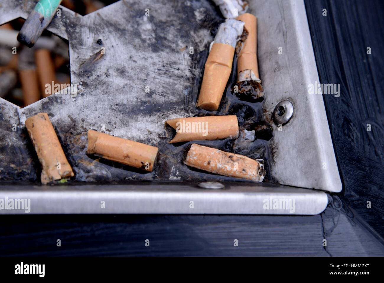 Cigarettes stubbed out hi-res stock photography and images - Alamy