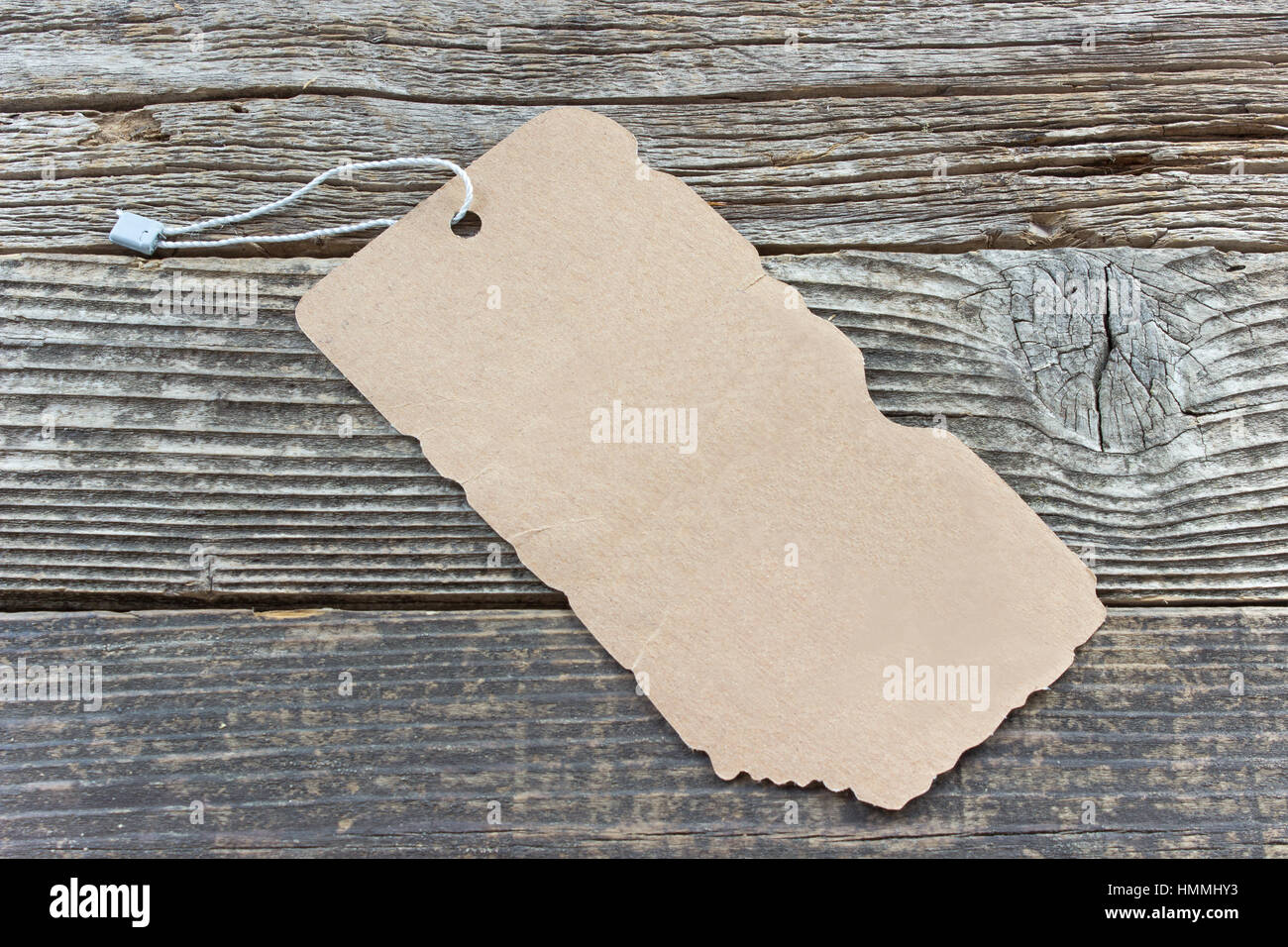 Blank price tag on wooden background Stock Photo - Alamy