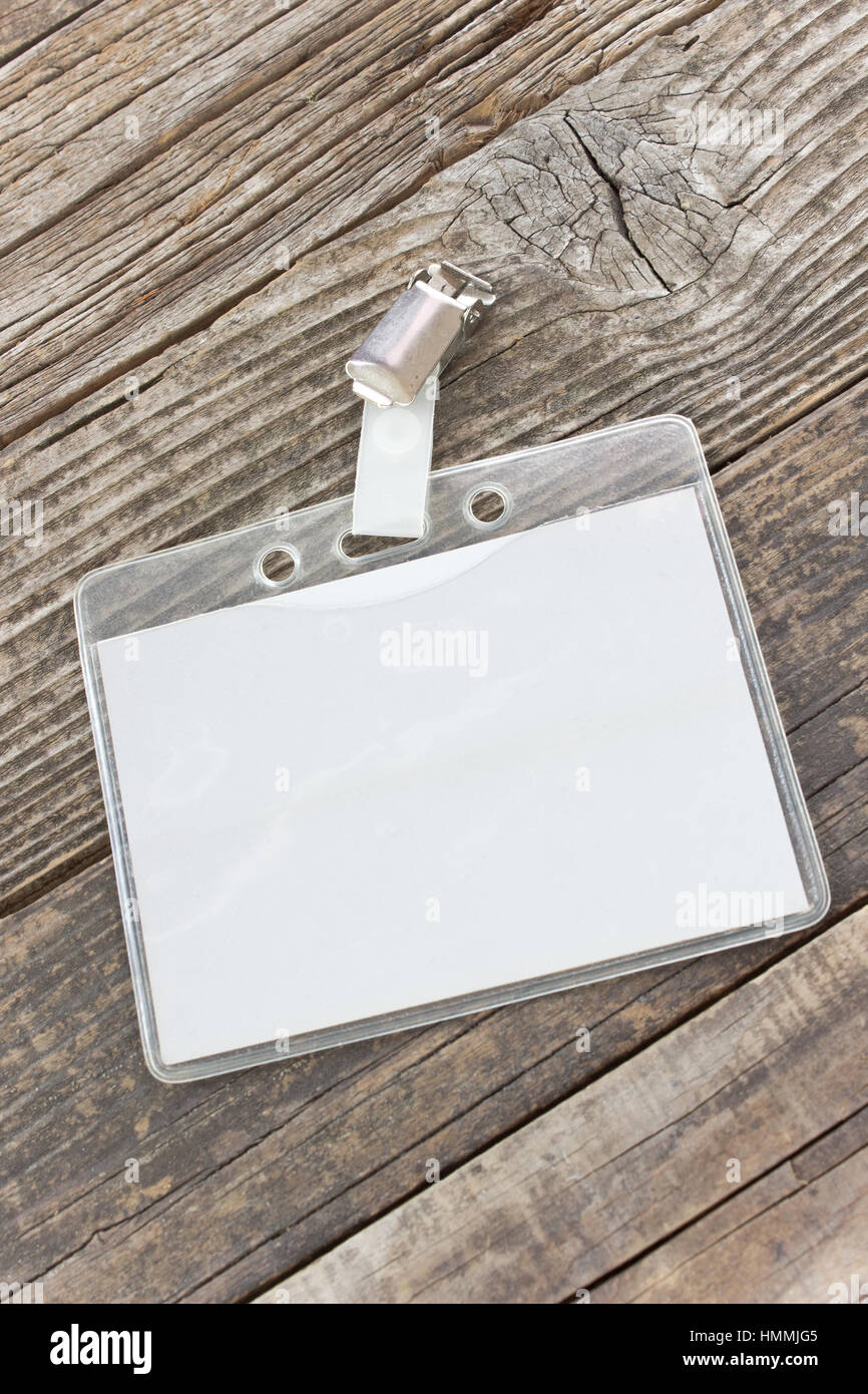 Blank ID card tag on wooden background Stock Photo - Alamy