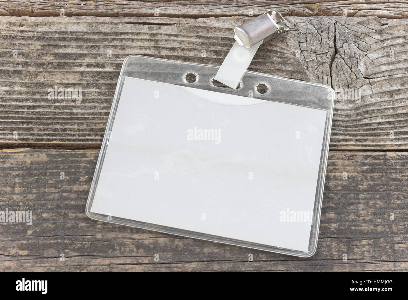 Blank ID card tag on old wooden background Stock Photo - Alamy
