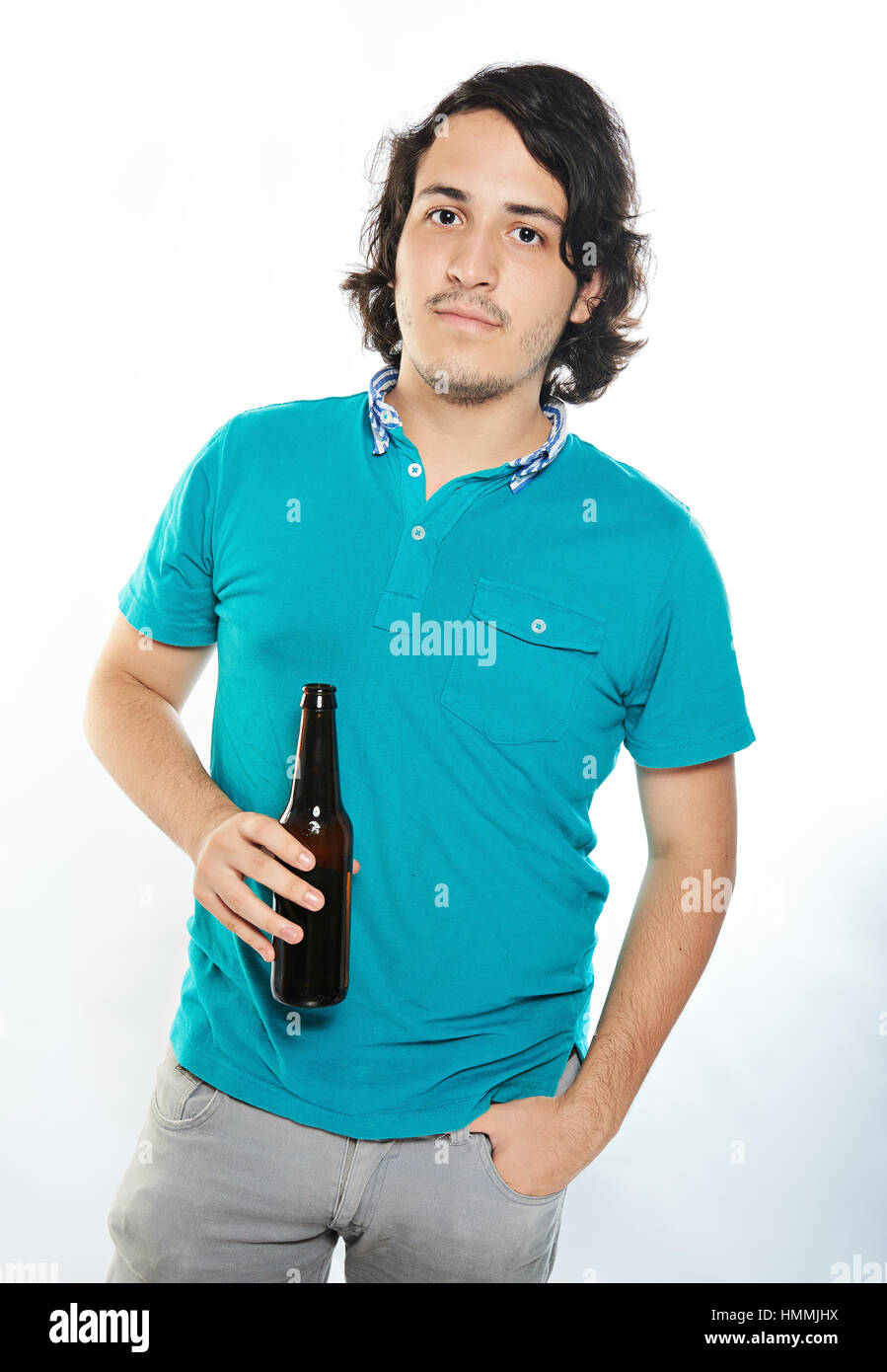 one young man with beer bottle isolated on white Stock Photo - Alamy