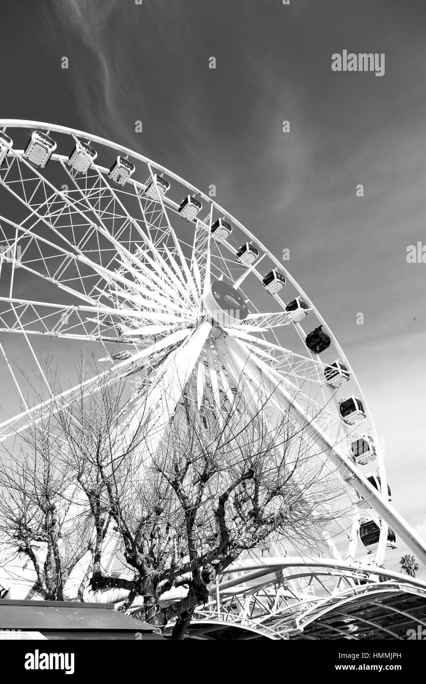 Colorful ferris wheel in the sky Black and White Stock Photos & Images ...