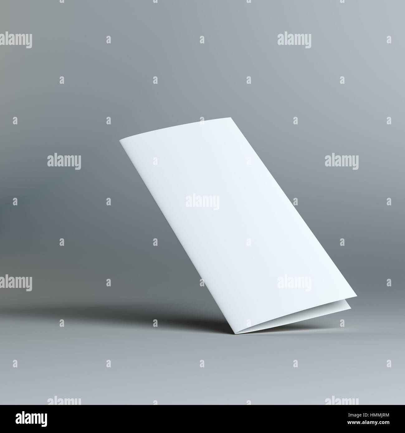 Stationary positioned two fold paper brochure Stock Photo - Alamy