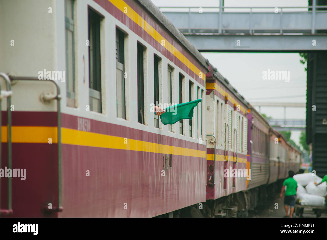 trainman show green flag as sign to driver when safe and ready for ...