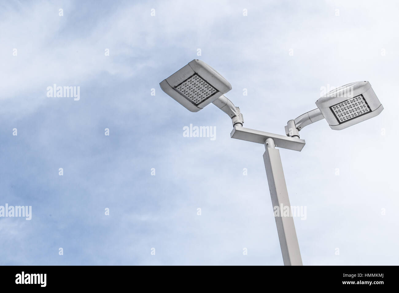 LED street lamp post with blue sky cloud Stock Photo - Alamy