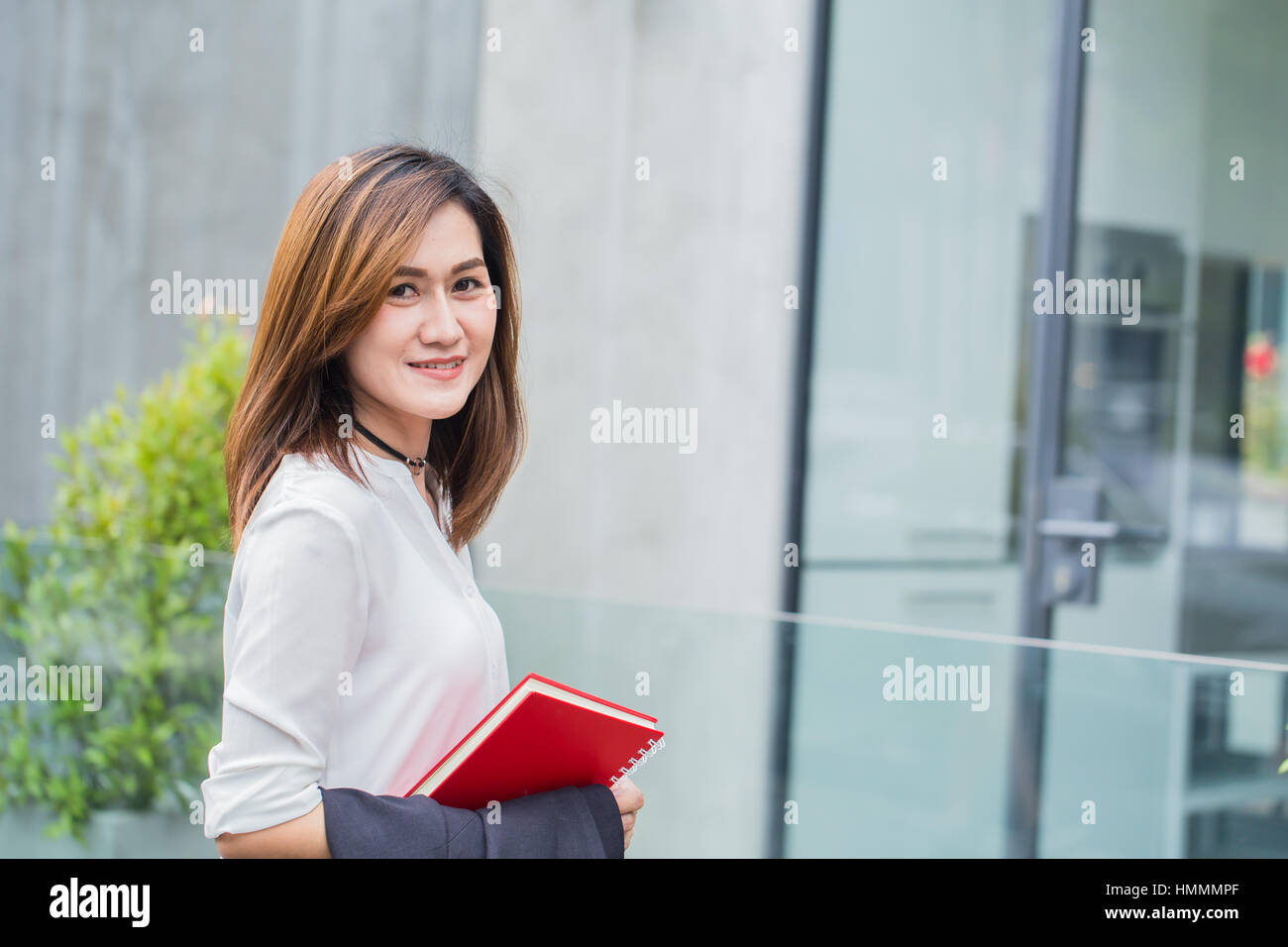 Thai business office worker in casual wear or working women smile and ...