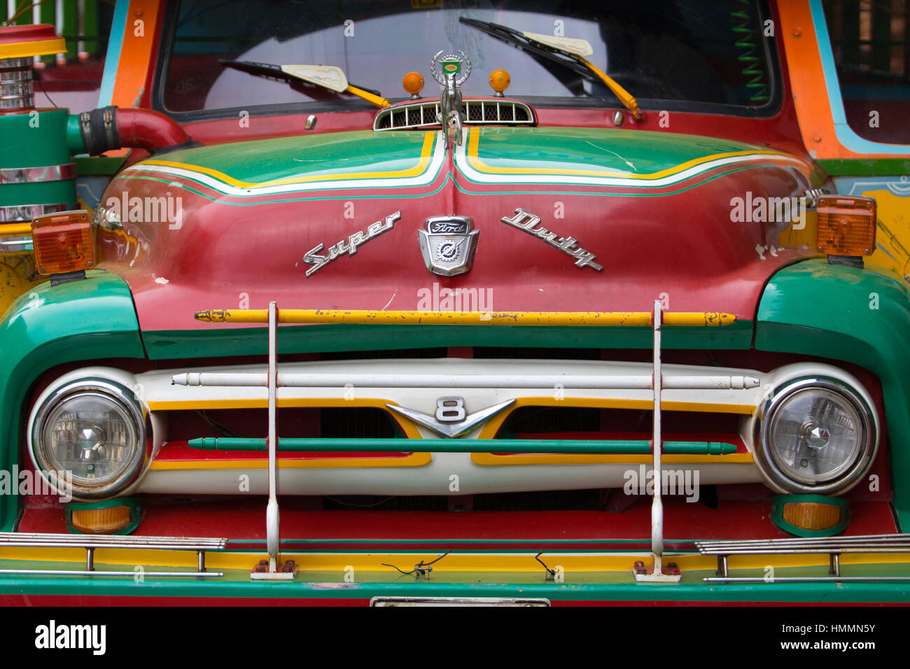 Close up detail of the front of a colourful bus Stock Photo - Alamy