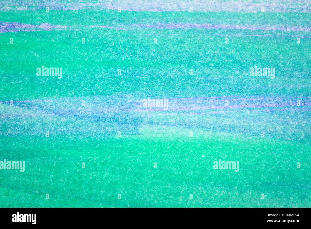 Macro shot of abstract hand drawn blue and green watercolor paints ...