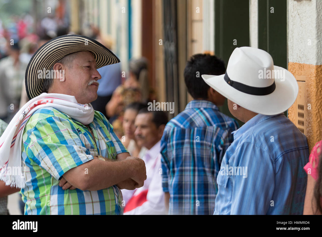 October 2,2016 El Jardin, Colombia: men interacting on the street of ...