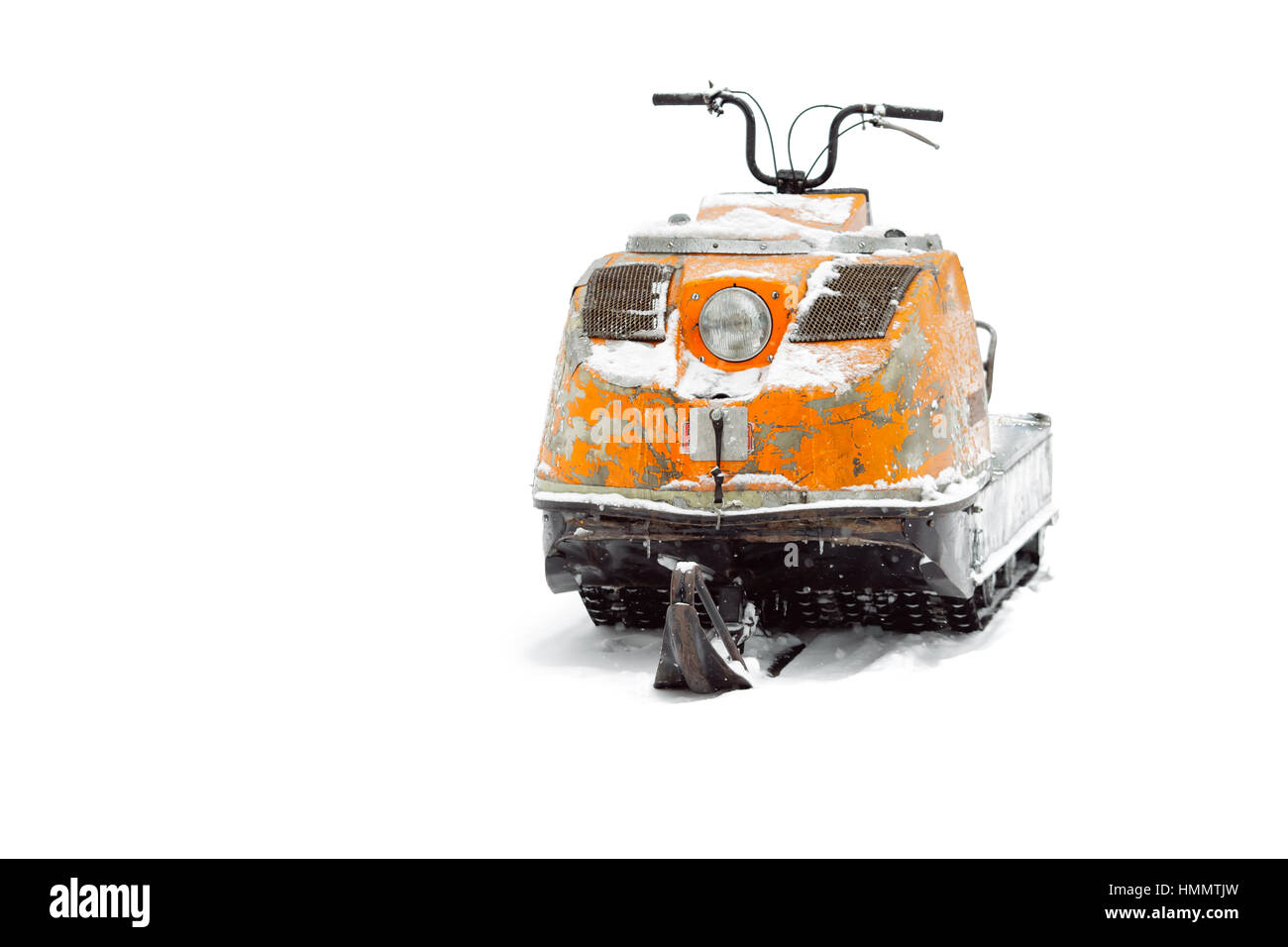 Old snowmobile. Isolated on white background Stock Photo - Alamy
