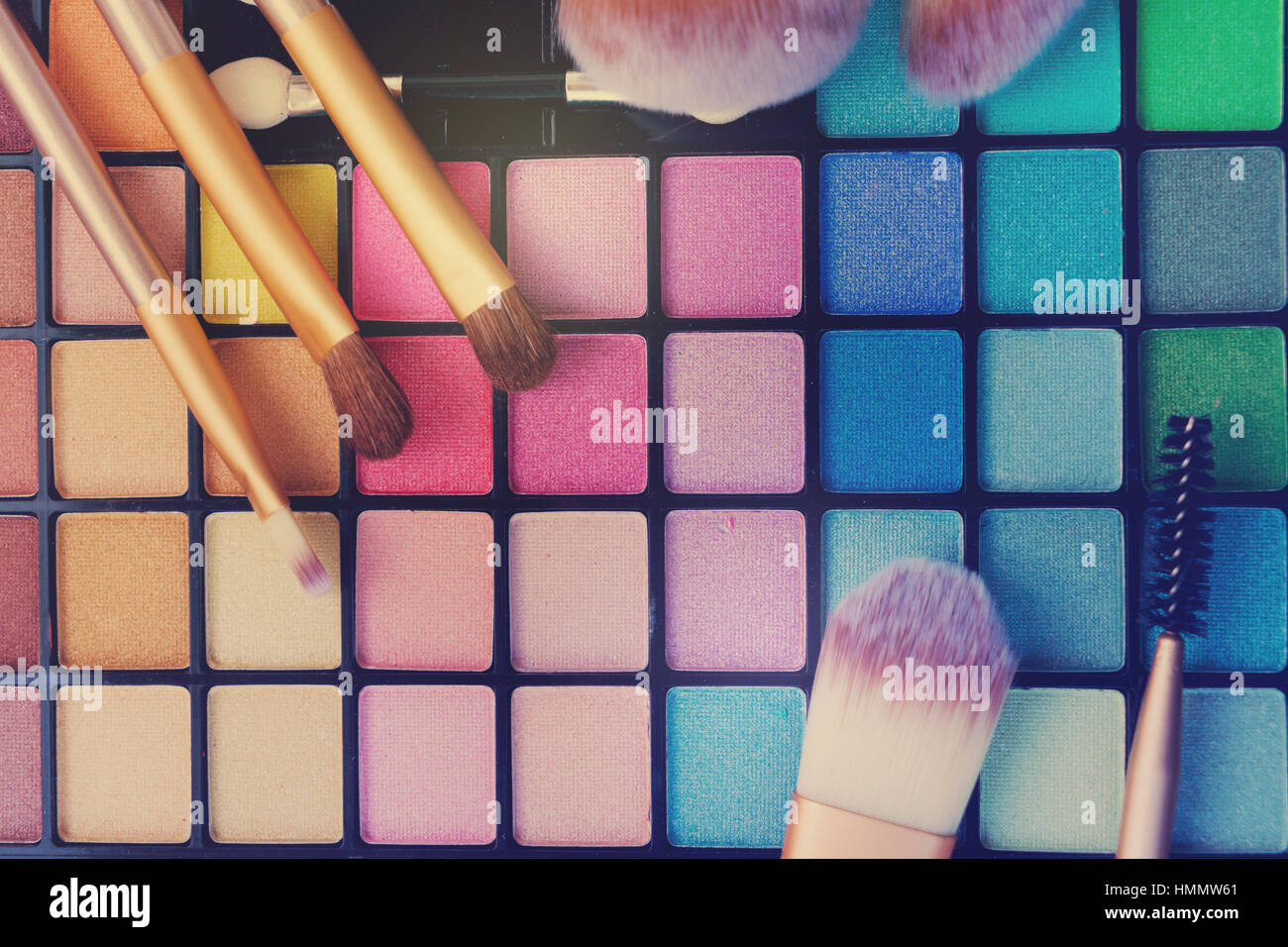 Brushes and eye-shadows palette Stock Photo - Alamy