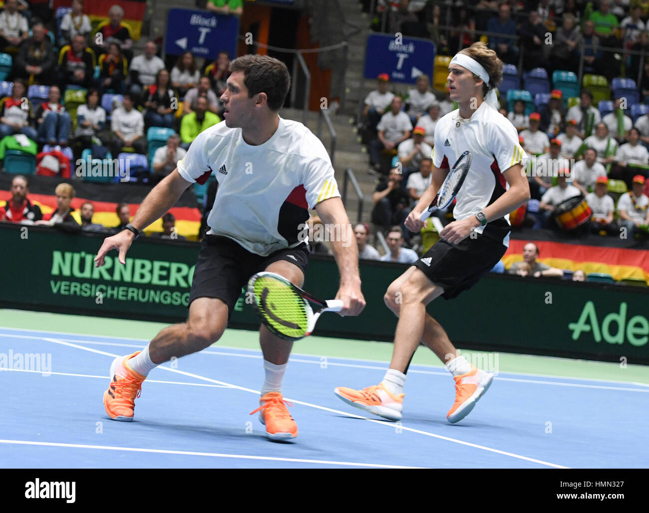 German tennis players Alexander (r) and Mischa Zverev in action during ...
