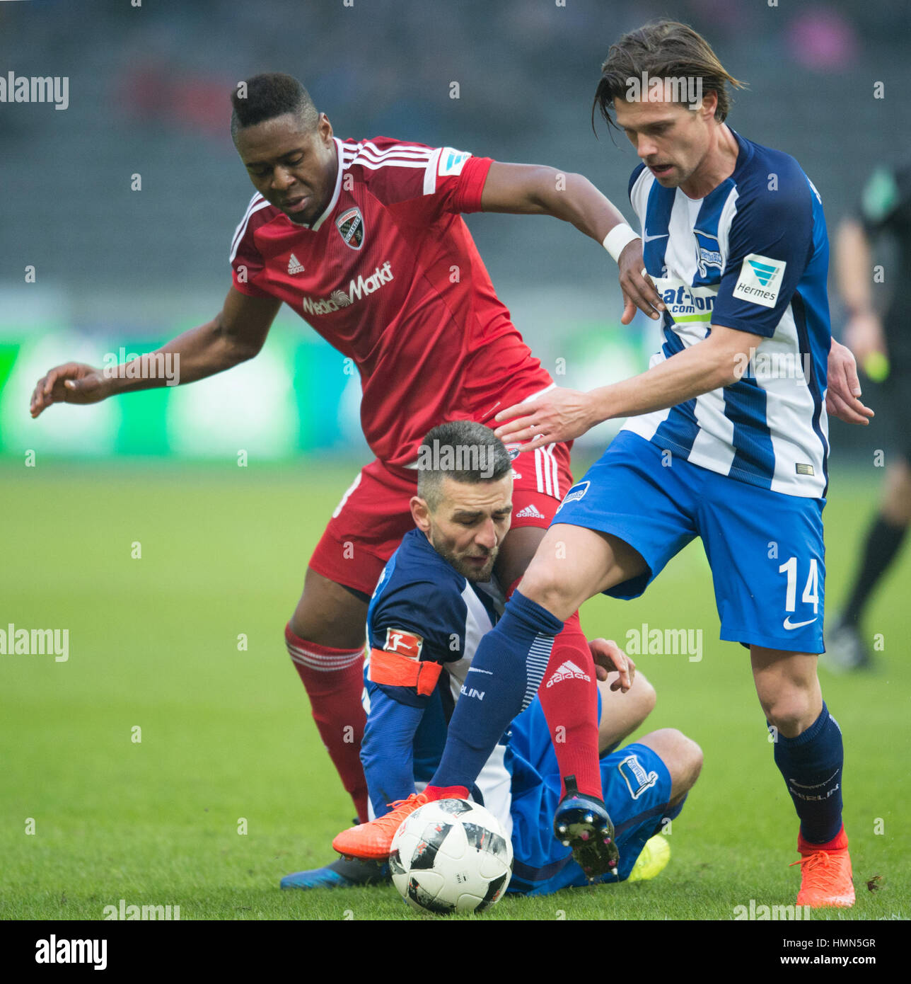 Hertha's Vedad Ibisevic (on the floor) Valentin Stocker (r) vie for the ...