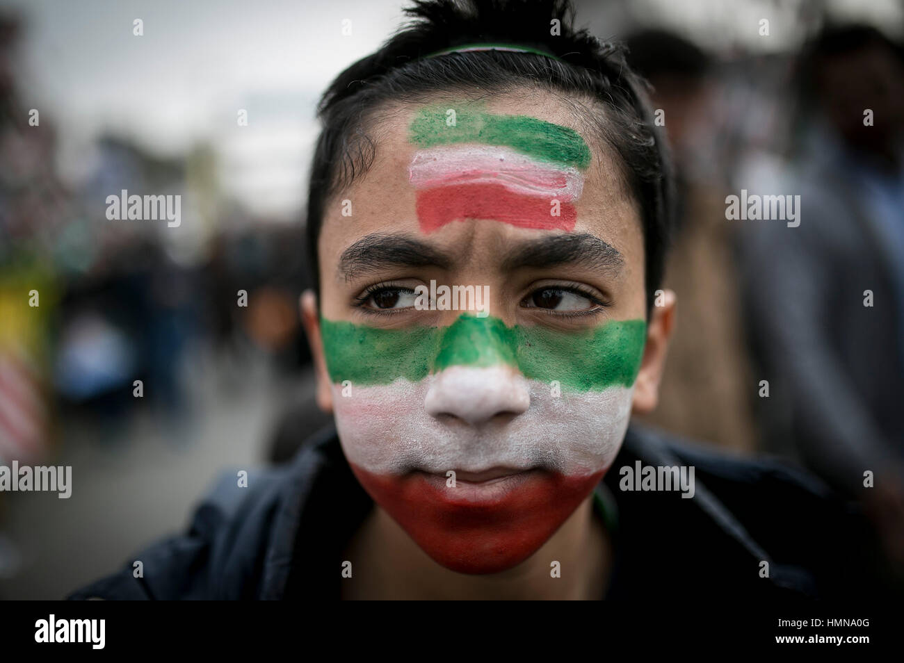 Tehran, Iran. 10th Feb, 2017. An Iranian boy whose face was painted ...